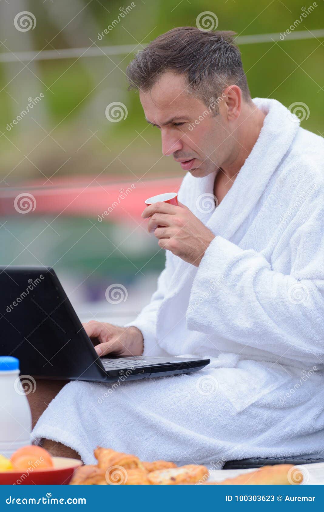 Rich man browsing laptop stock image. Image of computer - 100303623
