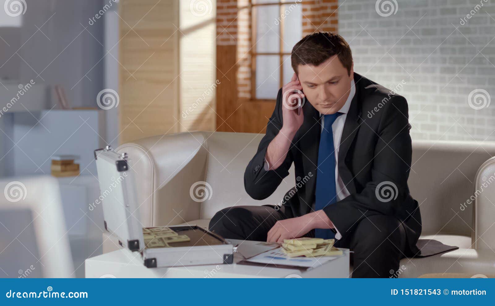 Rich Man Dealing with Partner by Phone, Big Money on Table, Profitable ... Rich Man Dealing with Partner by Phone, Big Money on Table, Profitable ...
