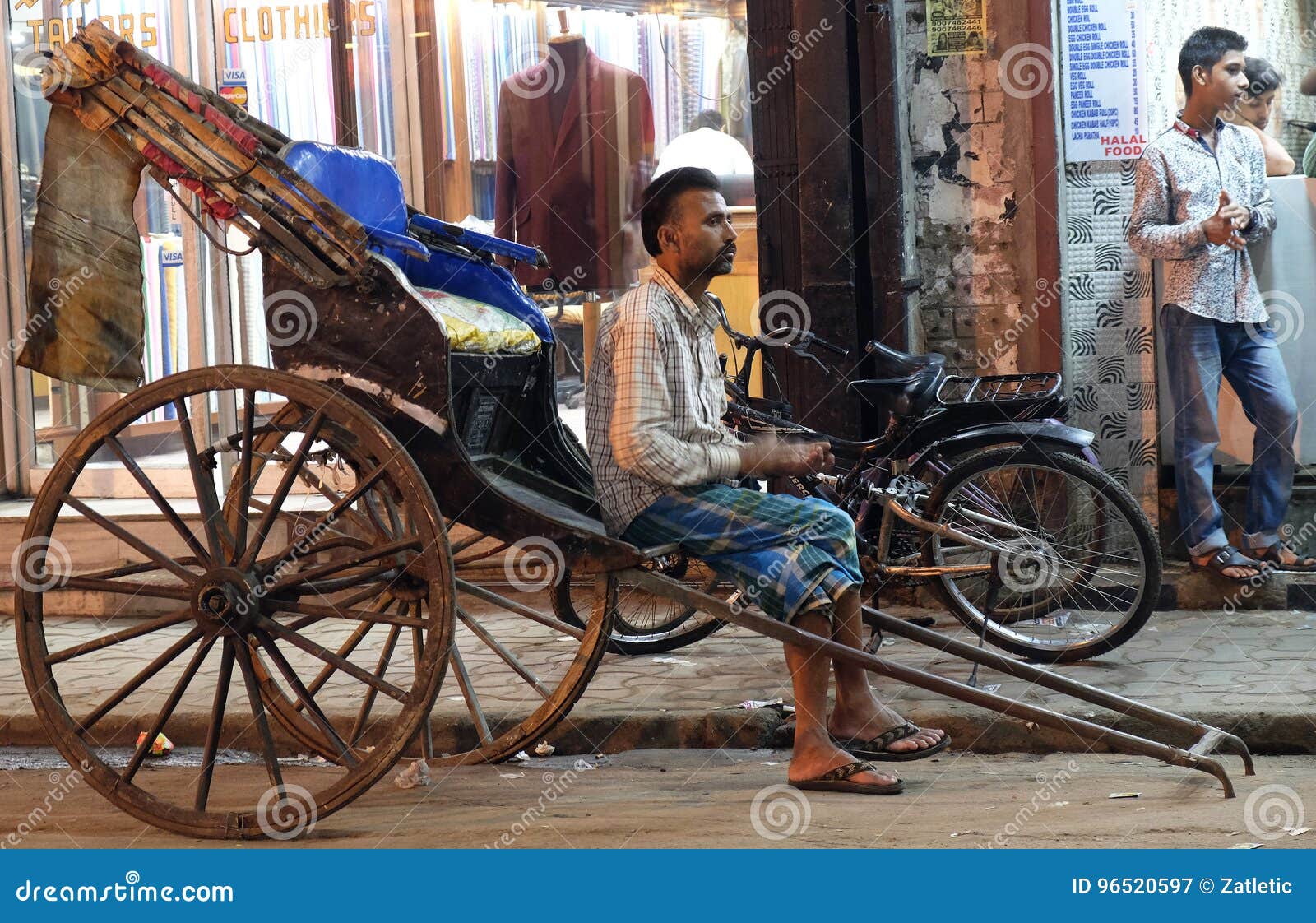 Rickshaw driver editorial photography. Image of bike - 96520597