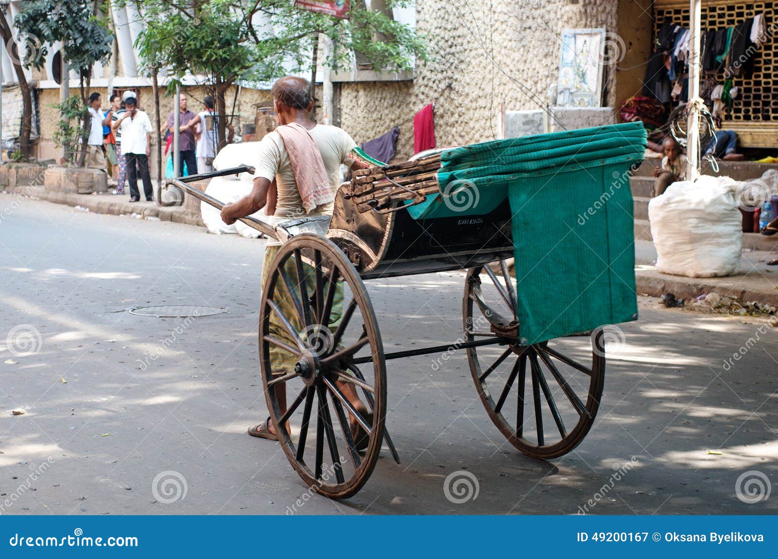 Rickshaw Driver Working in Kolkata, India Editorial Photography - Image ...