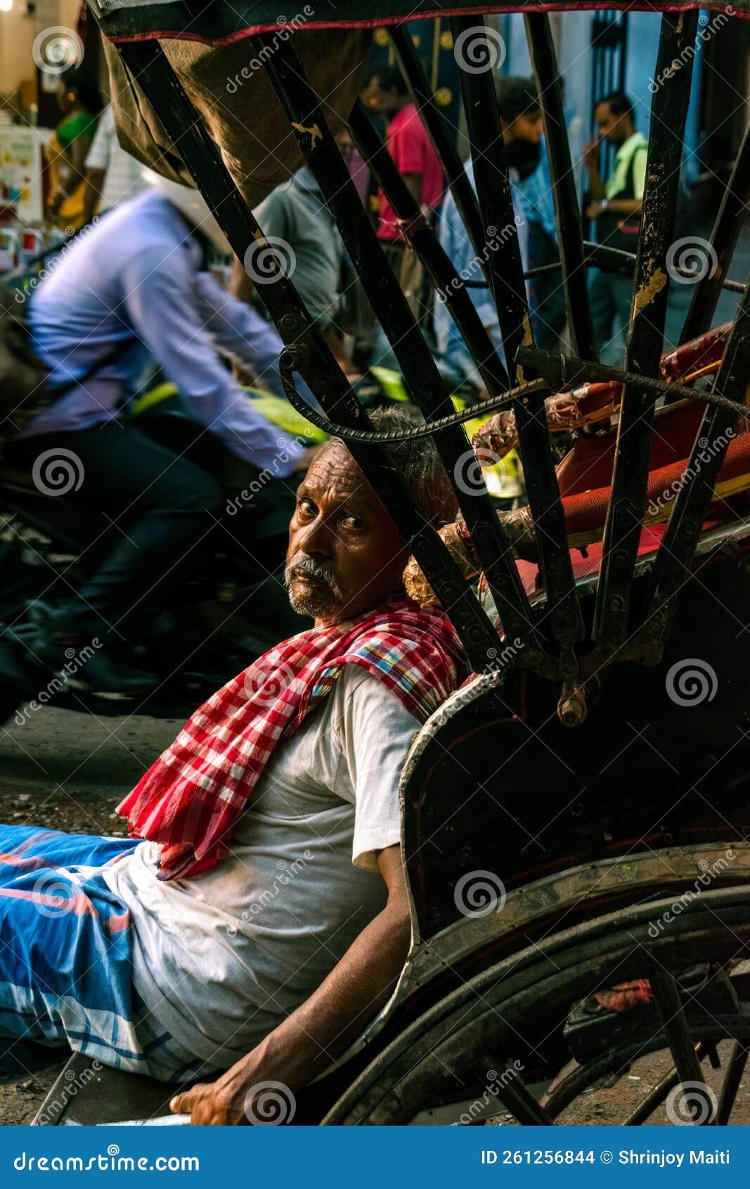 A Rickshaw Wala Relaxing and Staring into Camera Editorial Stock Image ...