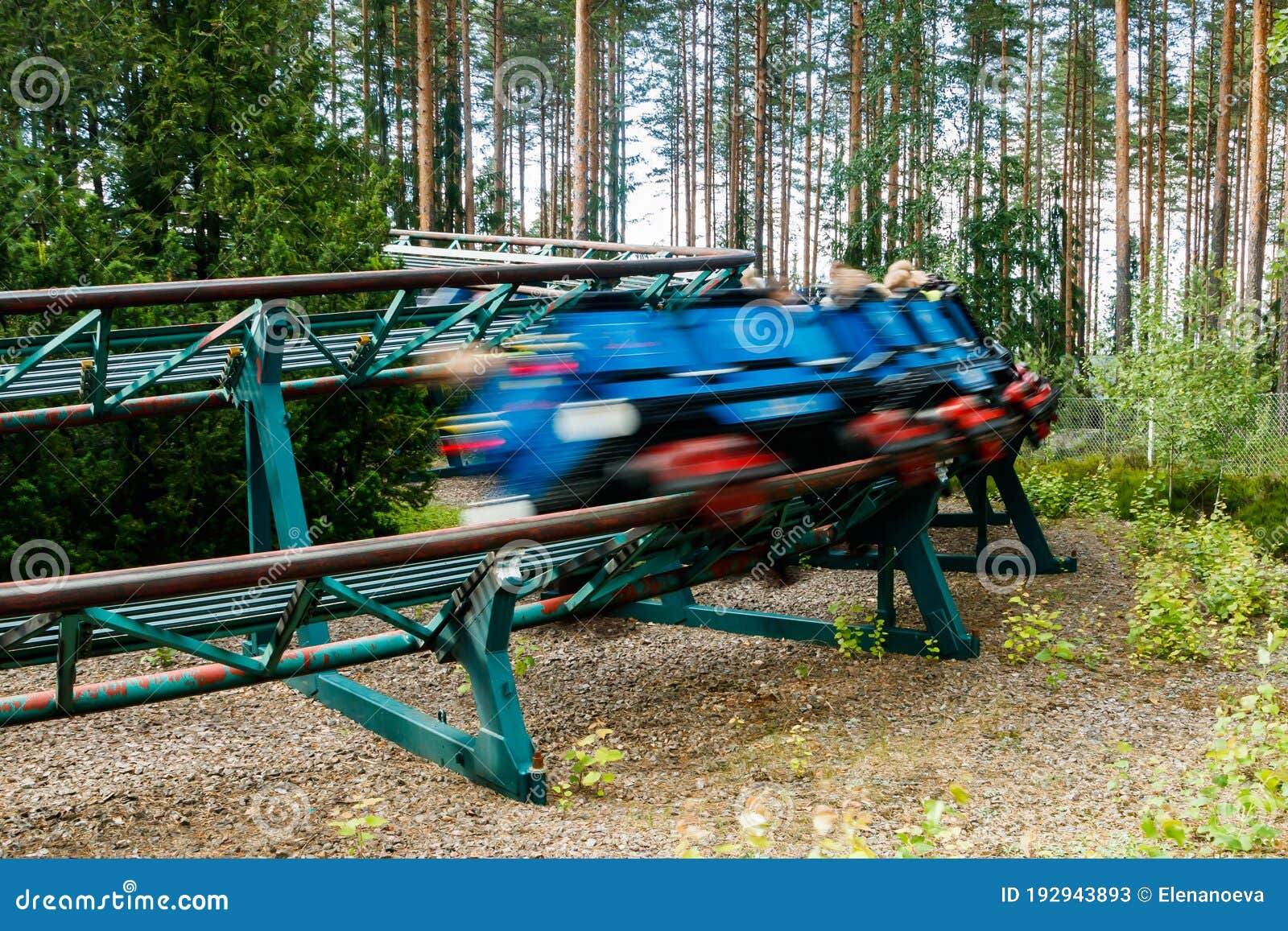Ride Roller Coaster in Motion in Amusement Park at Summer Day Stock ...