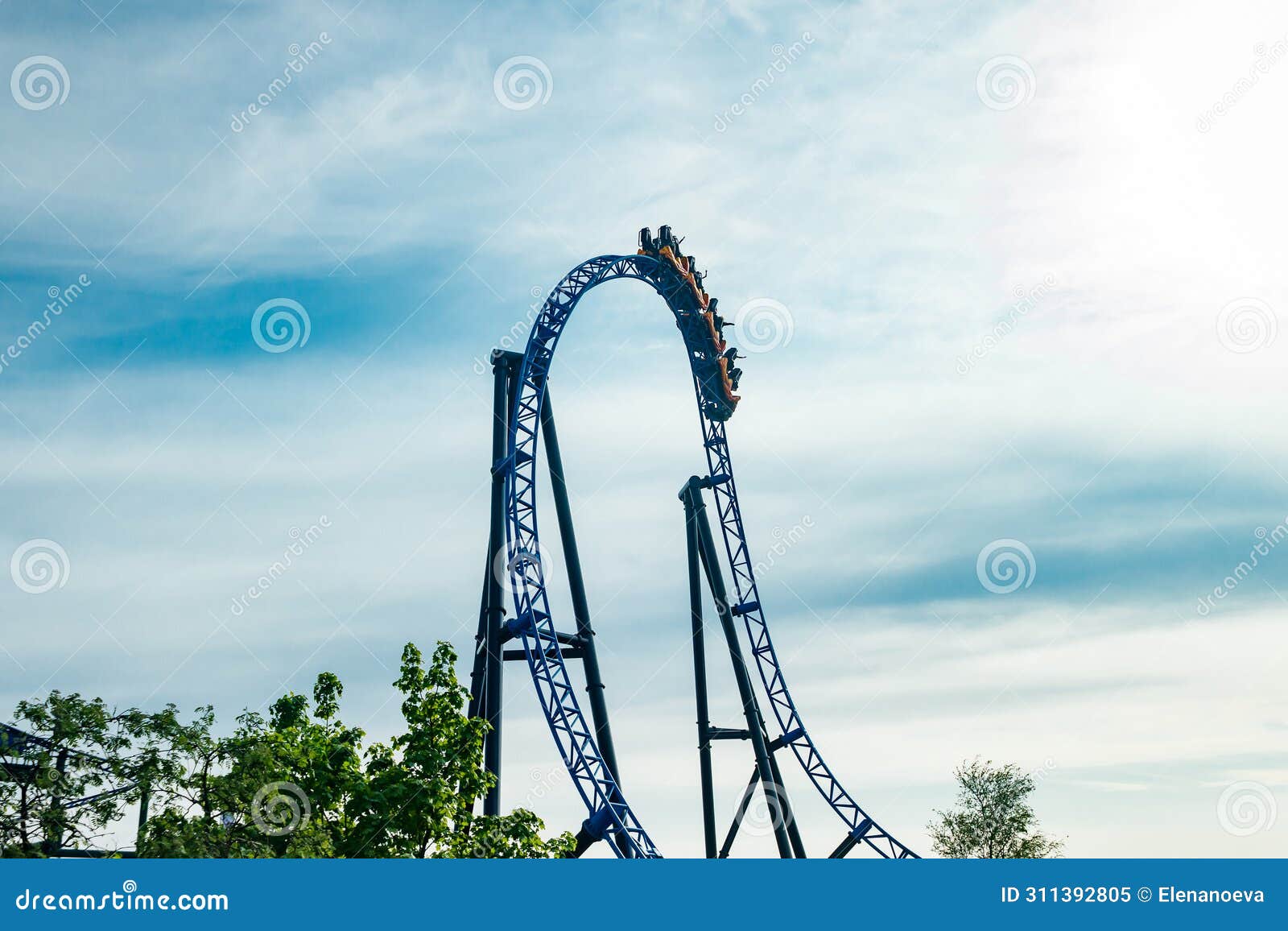 Ride Roller Coaster in Motion on Sky Background in Amusement Park Stock ...