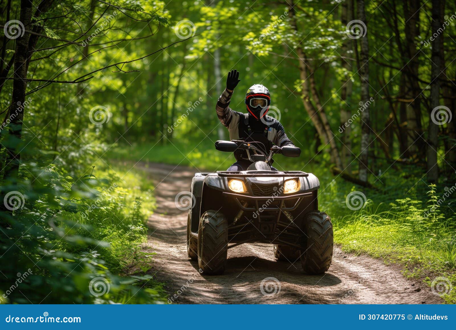 Rider on an Atv Waving at the Camera on a Forest Path Stock Image ...