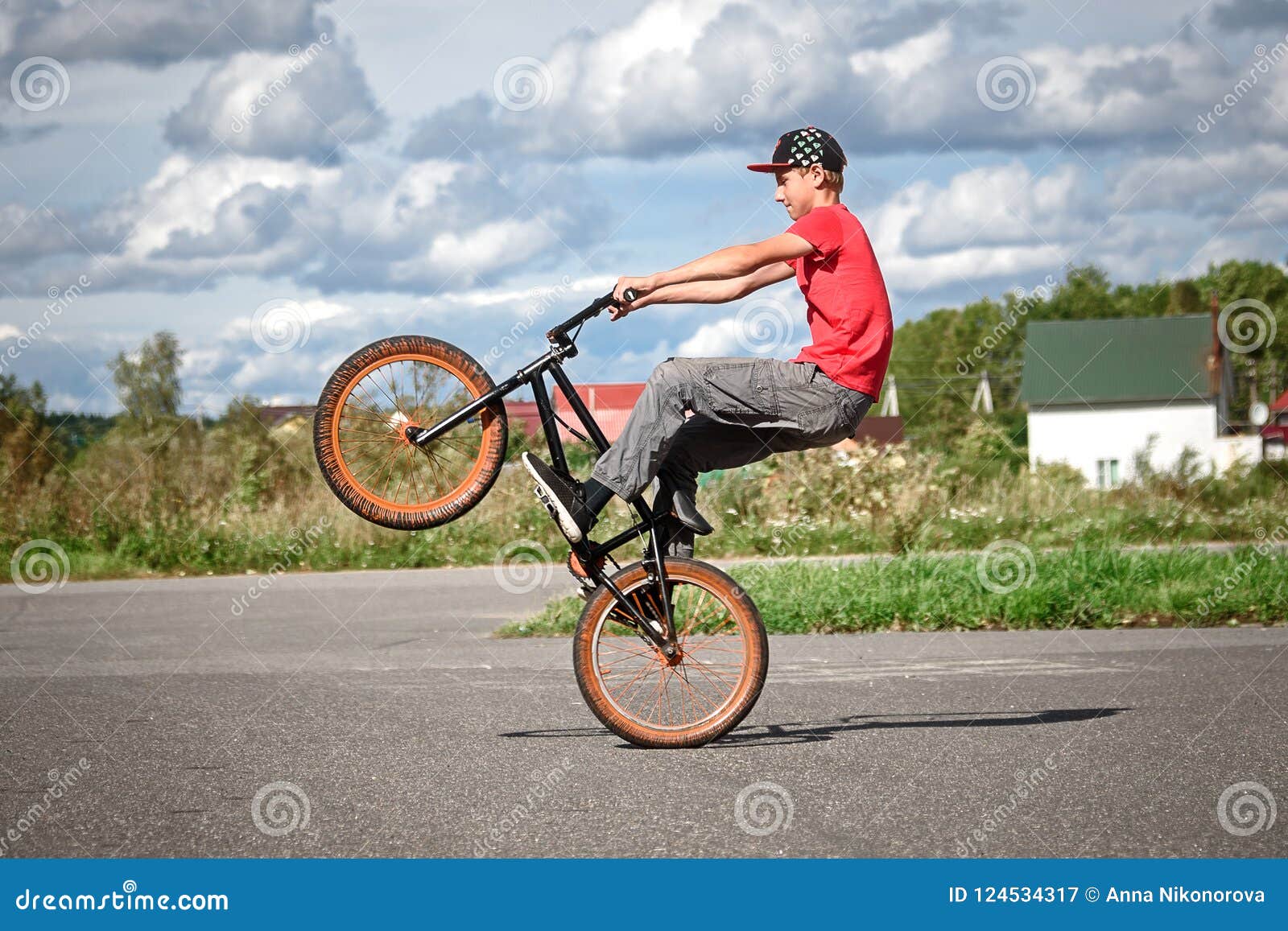 A Rider on a Bicycle Does Tricks Stock Image - Image of active ...