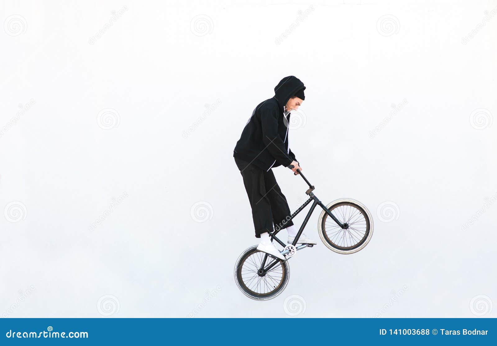 Rider Jumping with a Bicycle on a White Background. Rider Jump on Bmx ...