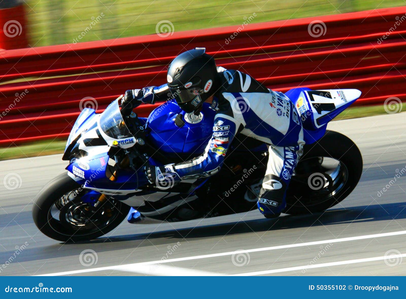 Rider leans into the turn editorial photography. Image of competition ...