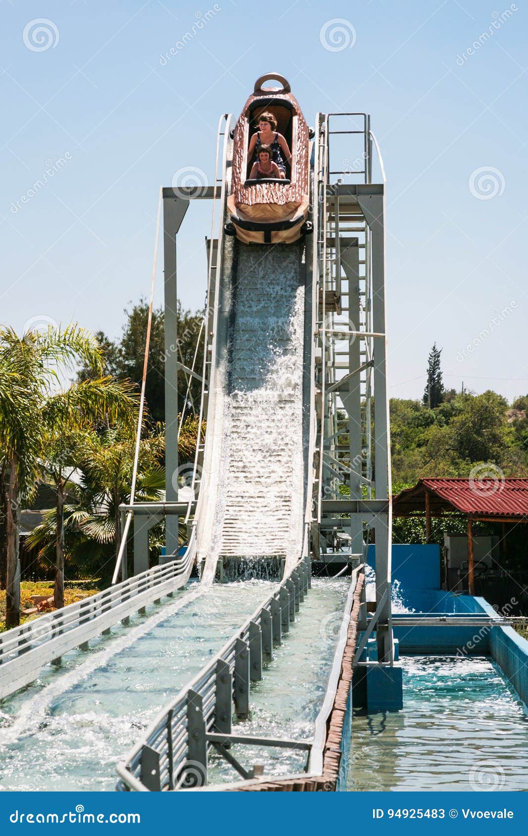 Riders in Boat on Water Slide Attraction Stock Image - Image of slide ...