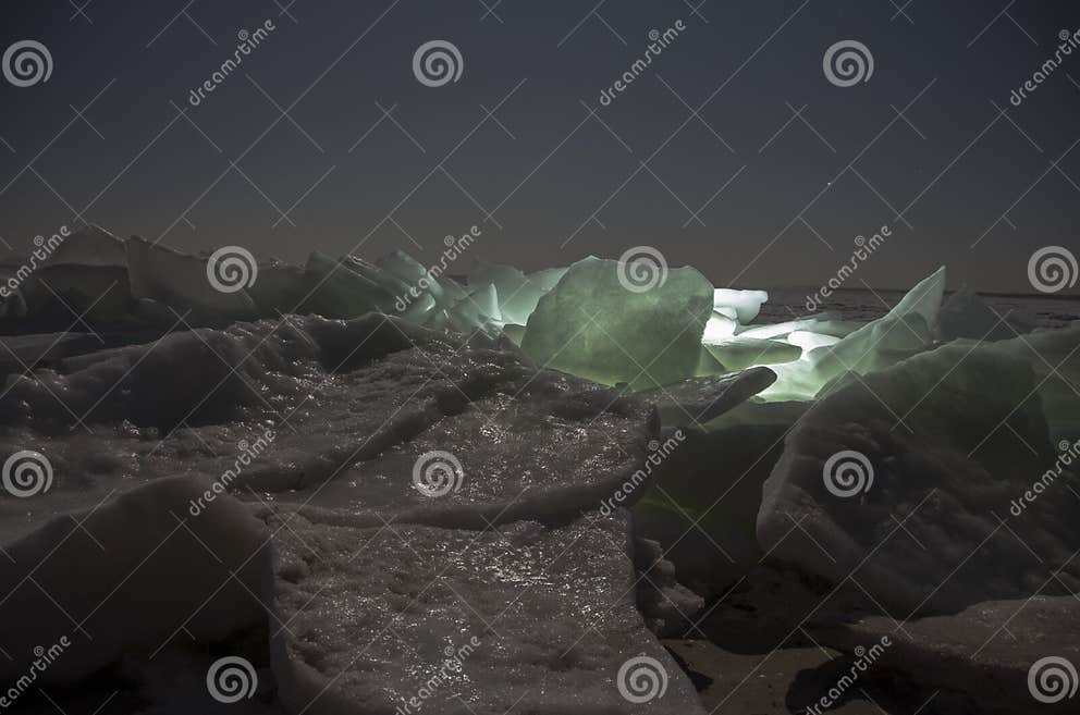 Ridged ice on the beach stock photo. Image of stars, moon - 84087634