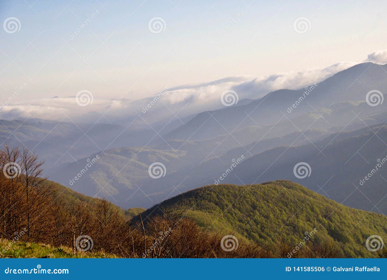 Ridges of the Hills in the Clouds at Sunset Stock Photo - Image of ...
