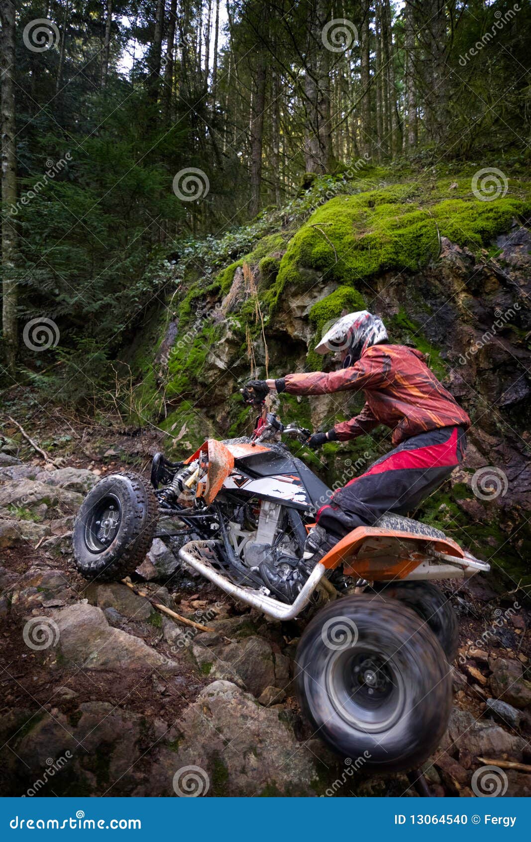 Riding ATV in mountains stock photo. Image of quadbike - 13064540