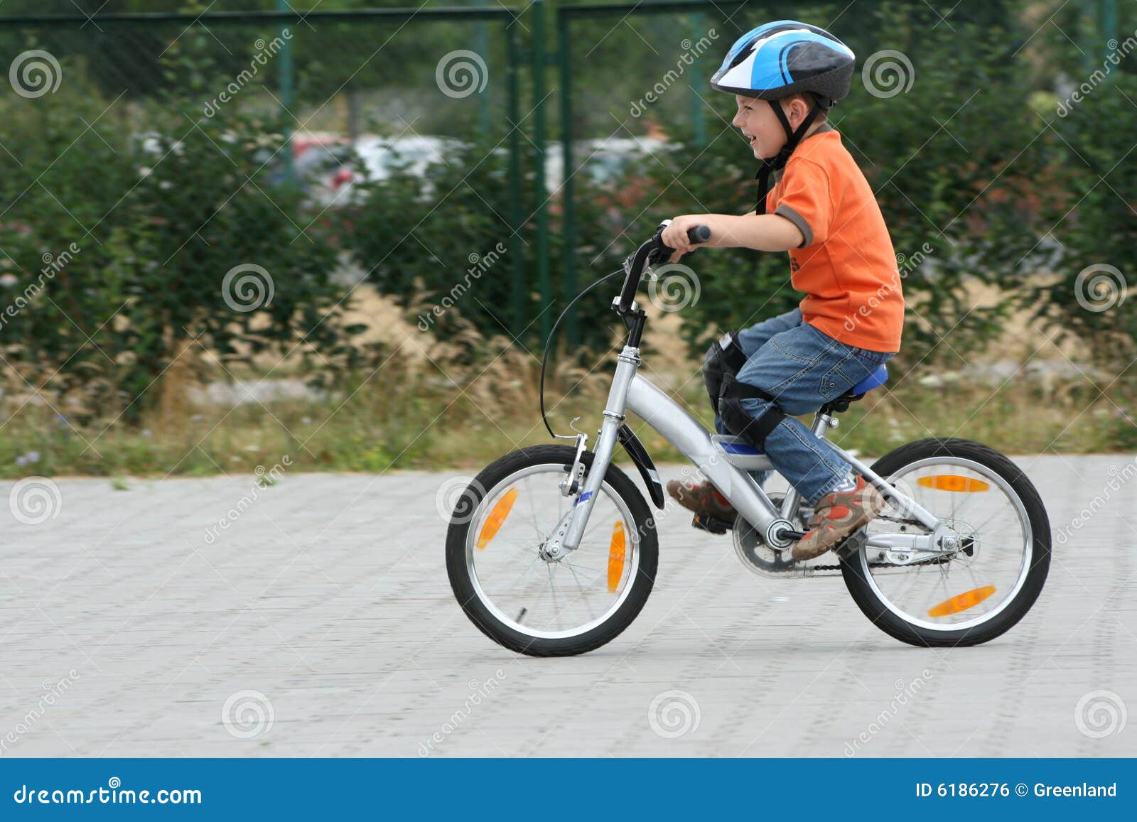 Riding bike in a helmet stock photo. Image of bicycles - 6186276