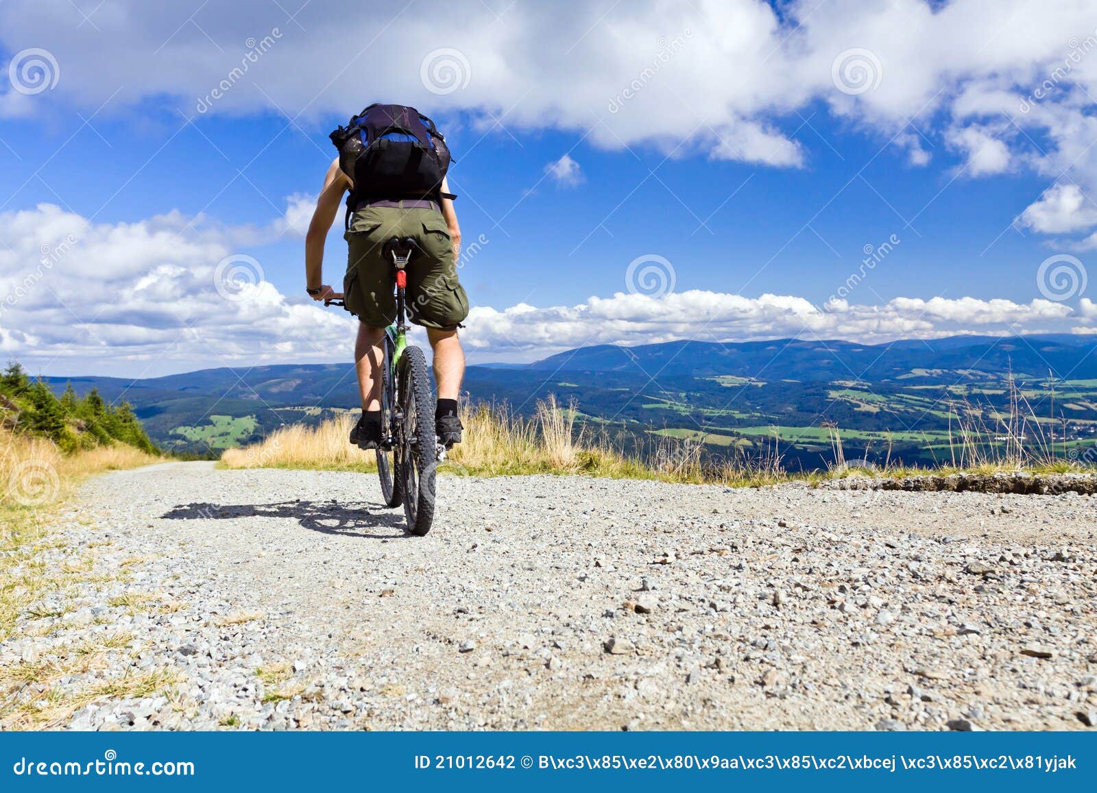 Riding a bike in mountains stock photo. Image of activity - 21012642