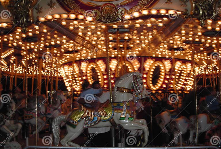 Riding the carousel stock image. Image of child, park, musical - 116413