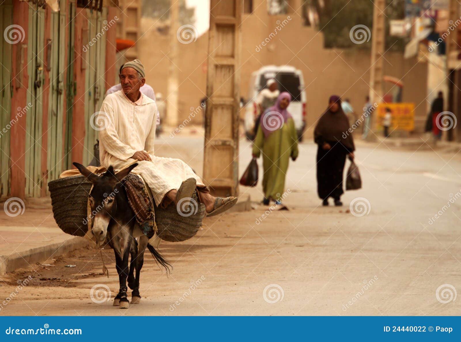 Riding a donkey editorial photography. Image of individual - 24440022