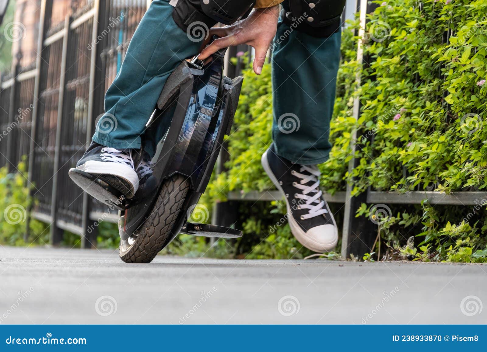 Riding an Electric Unicycle EUC Stock Photo - Image of personal ...