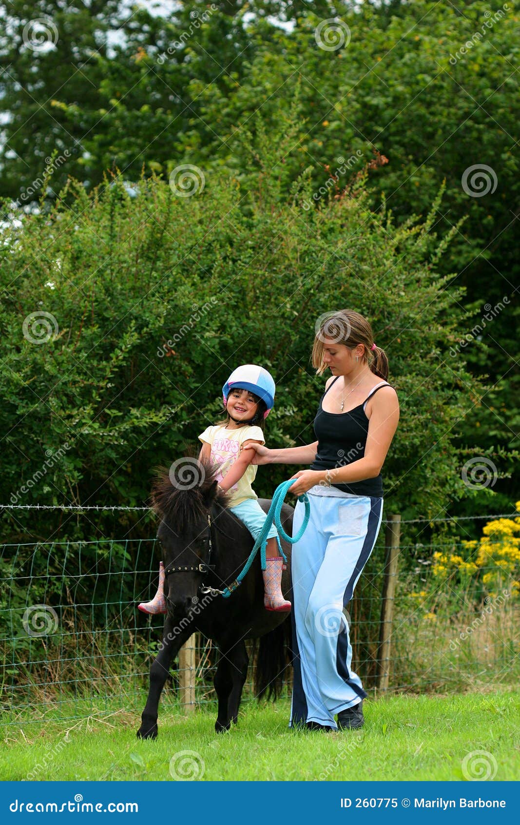 The Riding Lesson stock image. Image of little, bridle - 260775