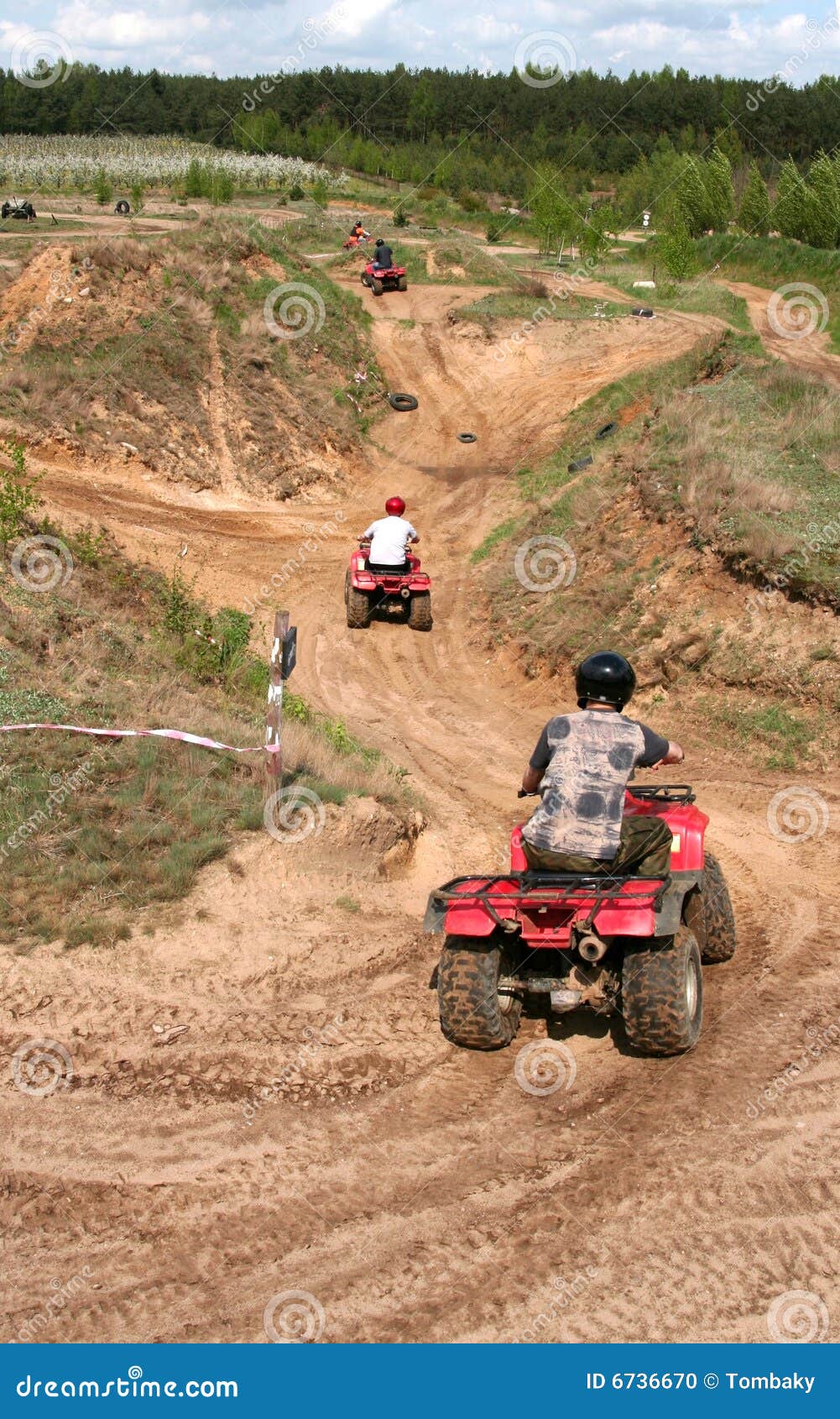 The riding on a quad stock photo. Image of tire, quad - 6736670