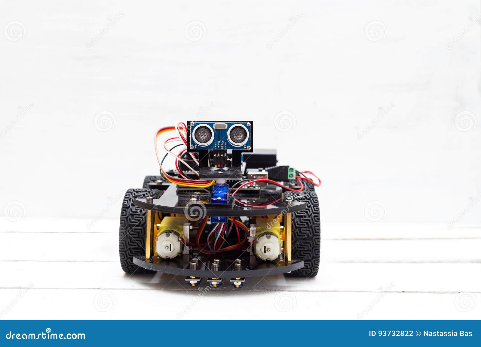 A Riding Robot on Four Wheels on a Light Background Stock Photo - Image ...
