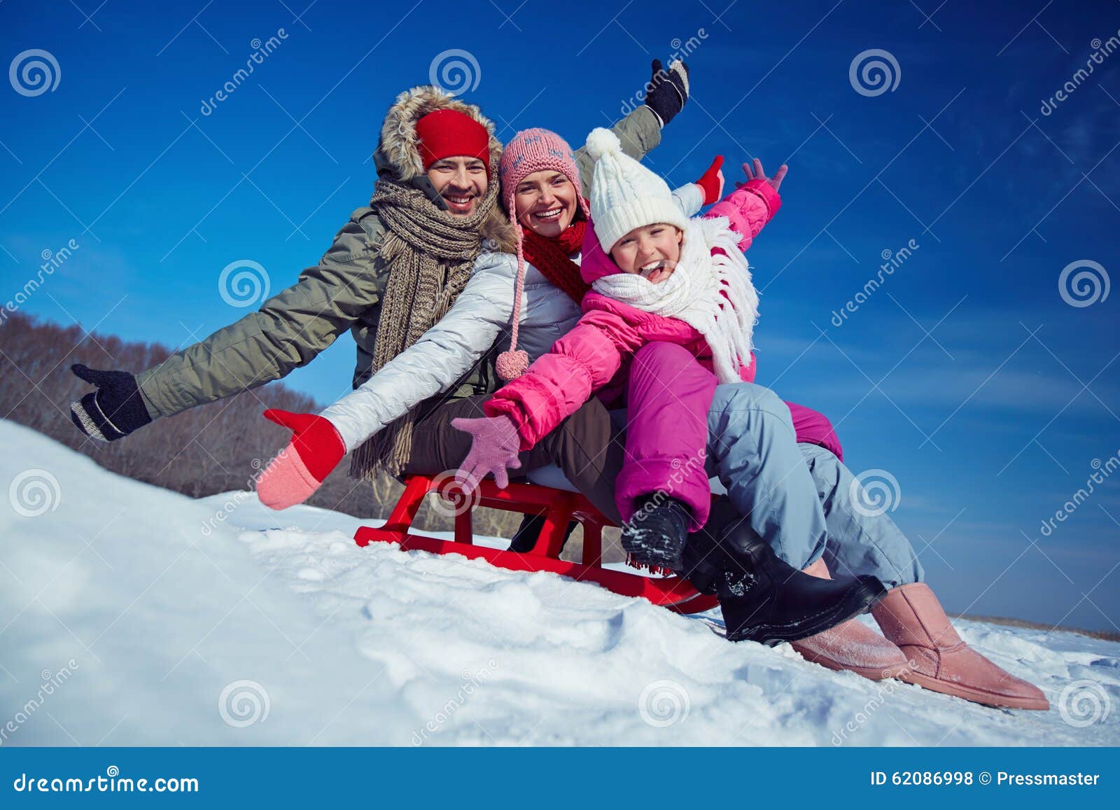 Riding on sledge stock photo. Image of handsome, father - 62086998