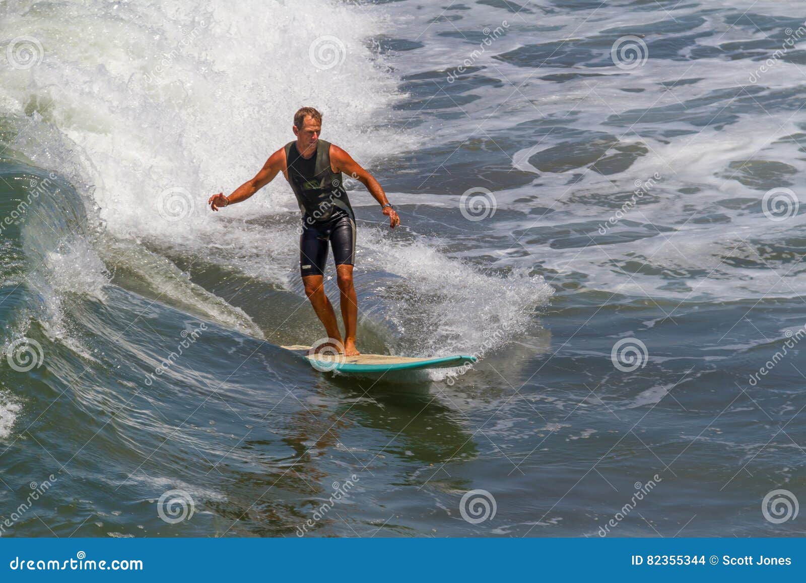 Riding a Wave editorial stock image. Image of wave, action - 82355344