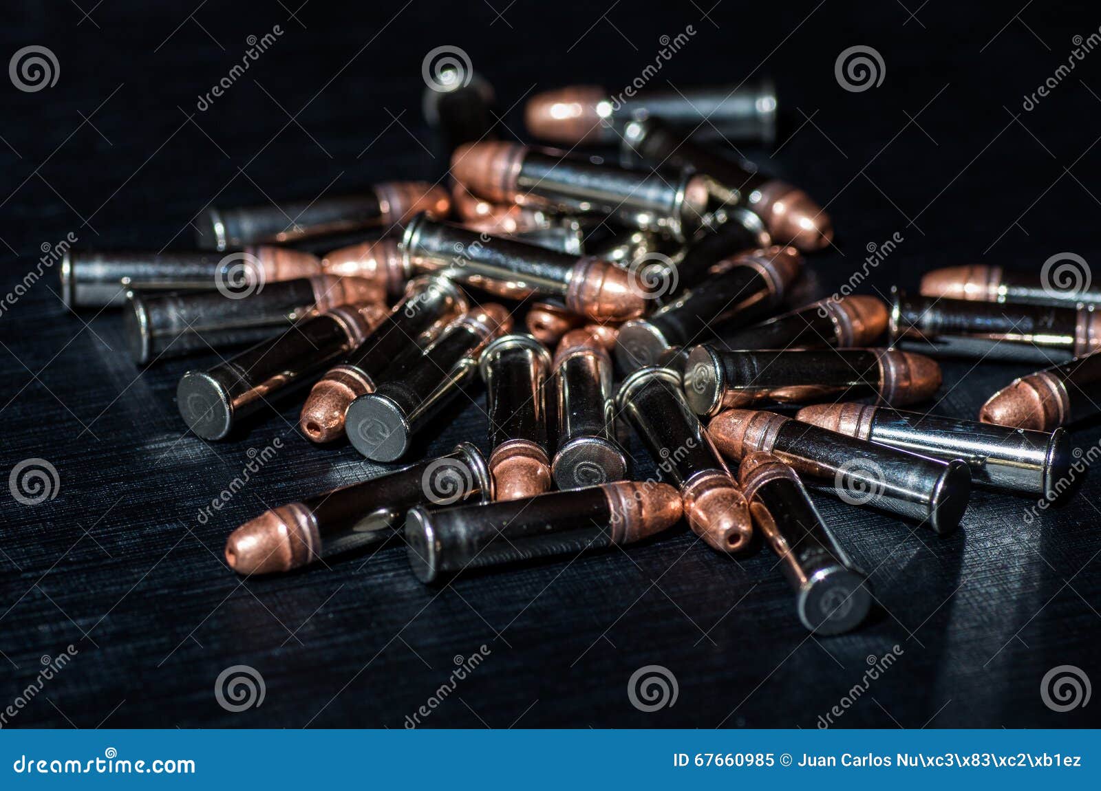 Rifle bullets over table stock image. Image of ammo, close - 67660985