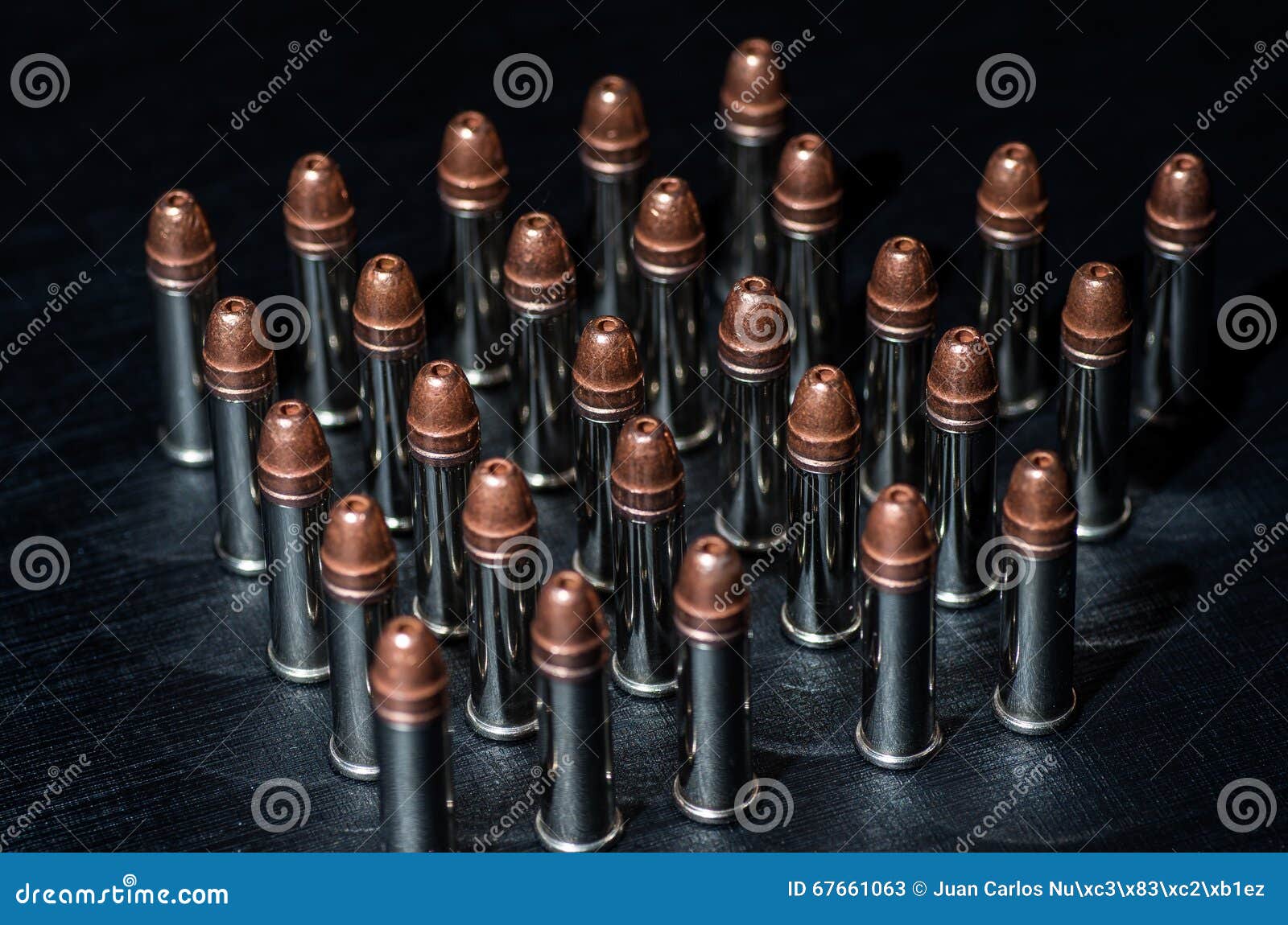 Rifle bullets over table stock image. Image of macro - 67661063
