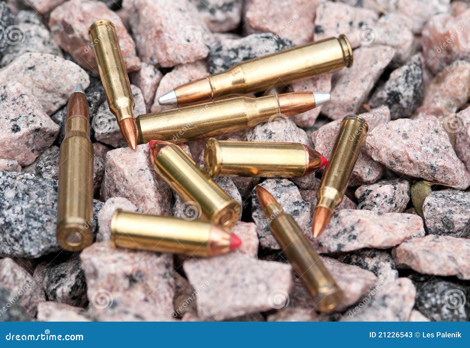 Rifle Bullets on Rocky Ground Stock Image - Image of rifle, shell: 21226543
