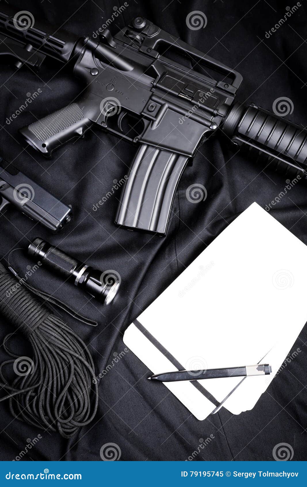 Rifle, gun, and notebook stock image. Image of desktop - 79195745