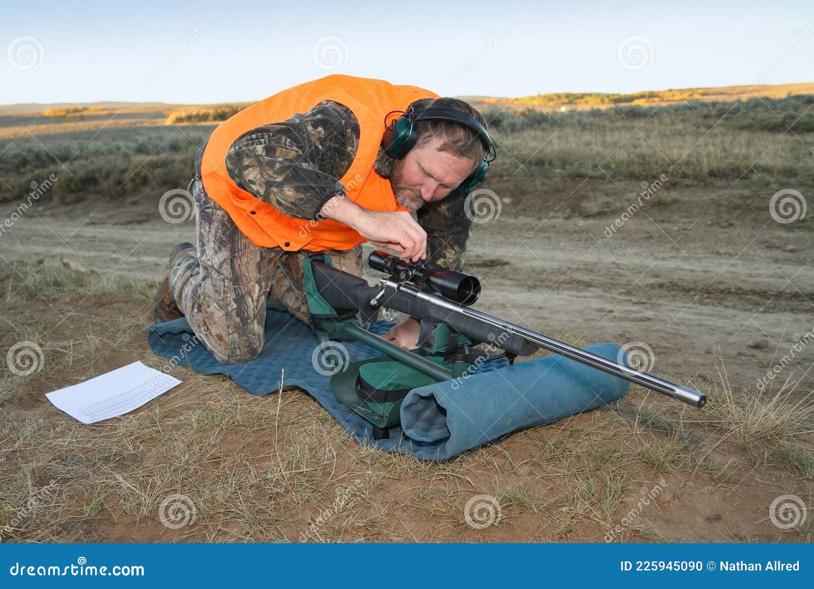 Rifle Hunter Silhouetted In Beautiful Sunset. Most Realistic Hunting ...