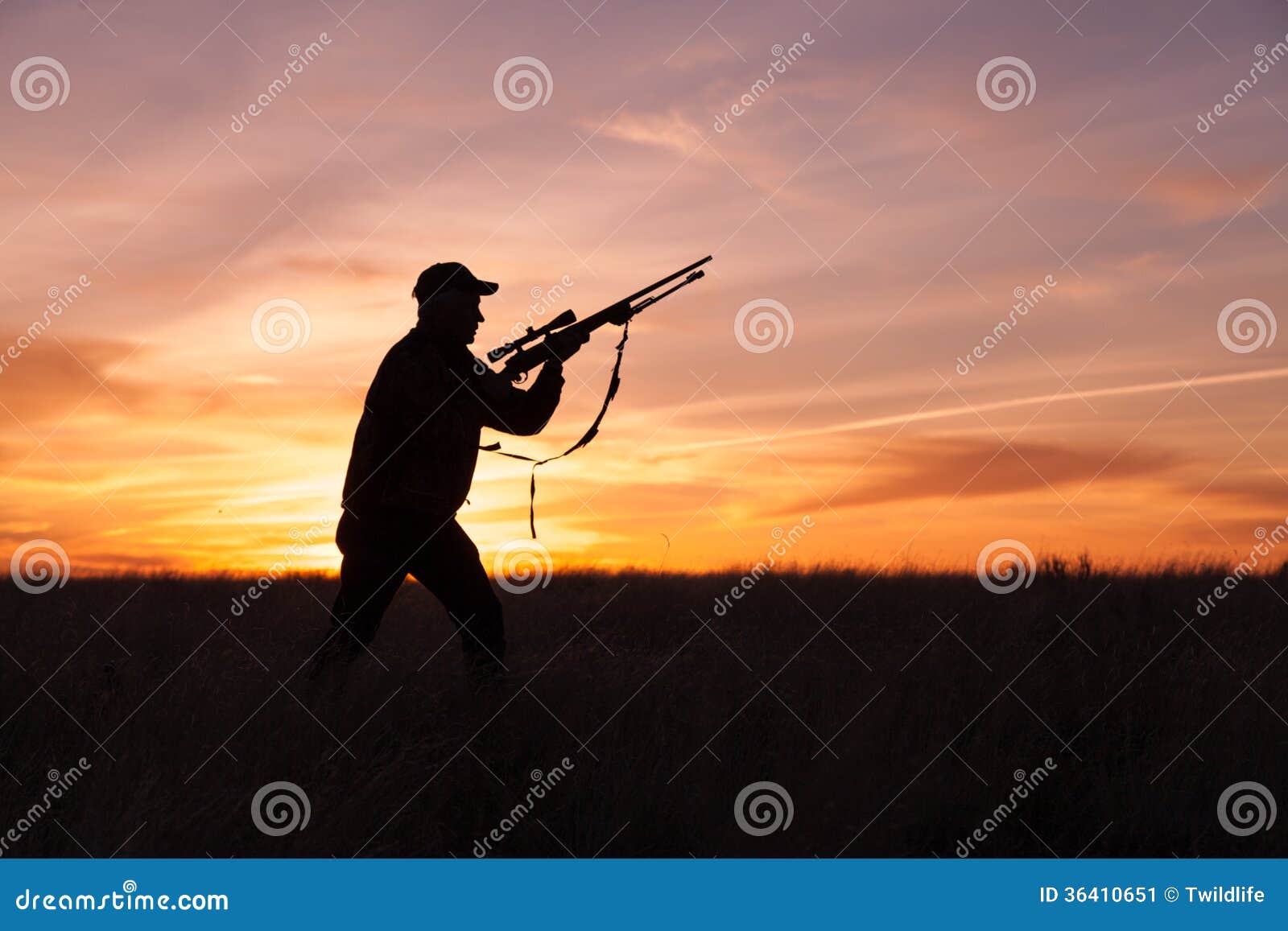 Rifle Hunter Silhouetted In Beautiful Sunset. Most Realistic Hunting ...