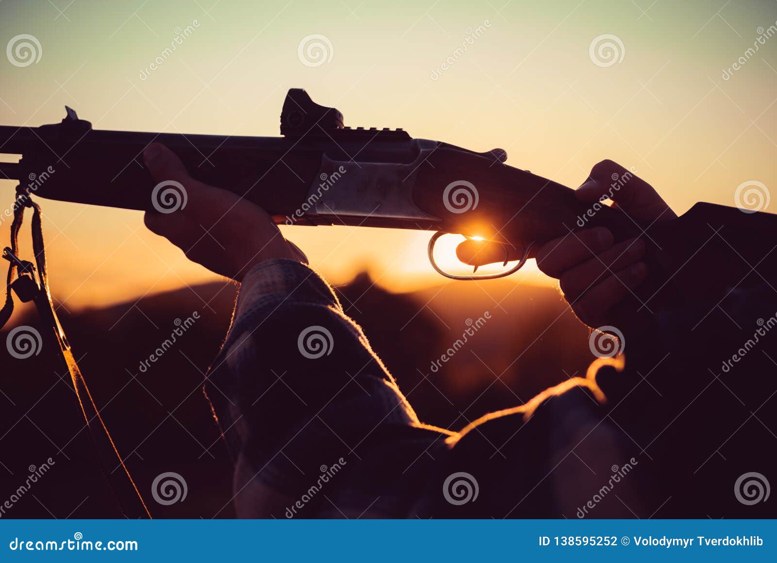 Rifle Hunter Silhouetted In Beautiful Sunset. Most Realistic Hunting ...