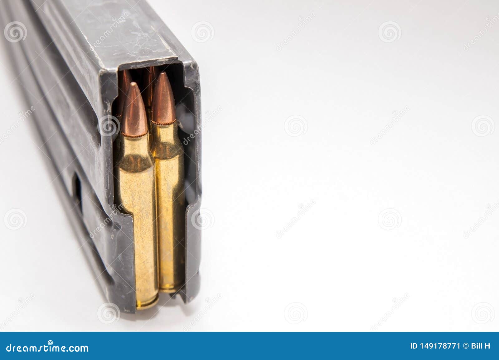 A Rifle Magazine Loaded with 556 Bullets on a White Background Stock ...