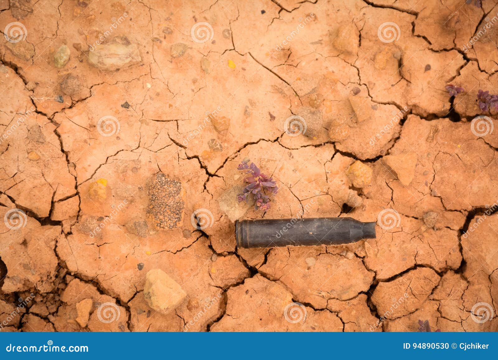 Rifle Shell on Red Dirt Background Stock Photo - Image of metal ...