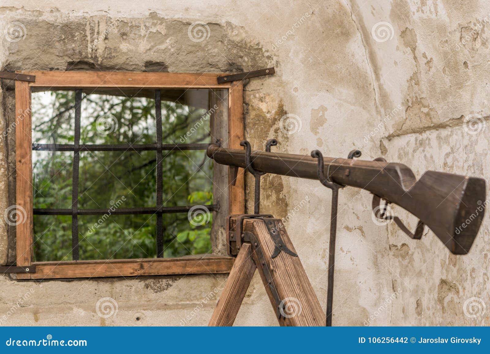 Rifle shooting from window stock photo. Image of fort - 106256442