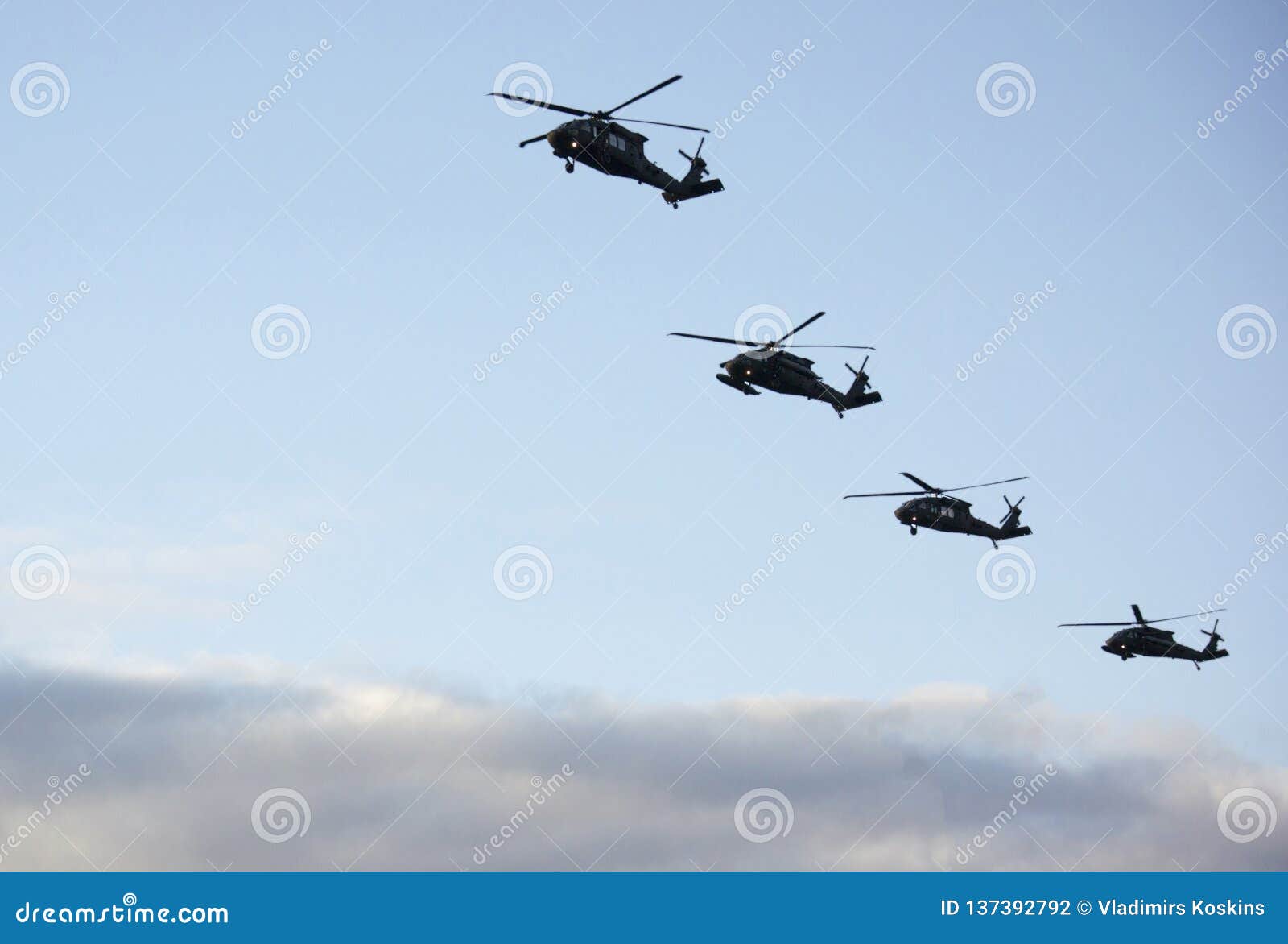 Riga. Helicopter Squadron at the Parade Stock Photo - Image of clouds ...