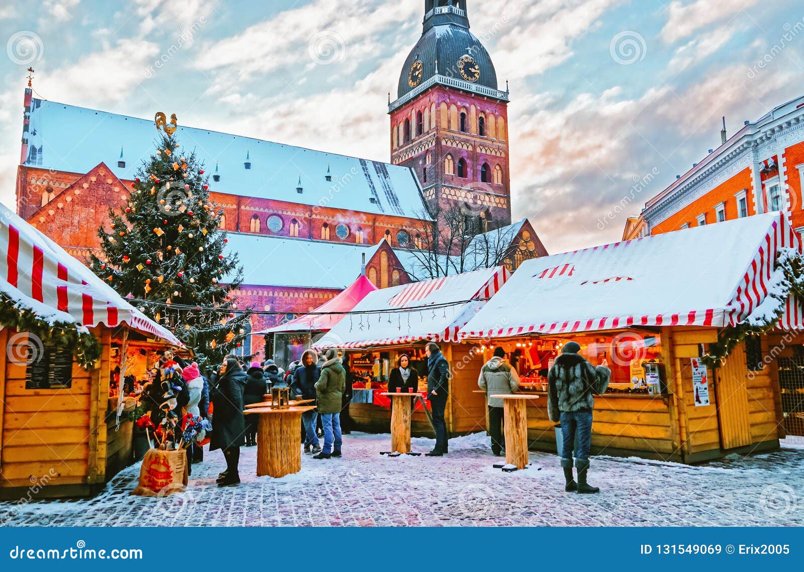 Riga, Latvia - December 28, 2014: Christmas Market at Dome Square in ... Riga, Latvia - December 28, 2014: Christmas Market at Dome Square in ...