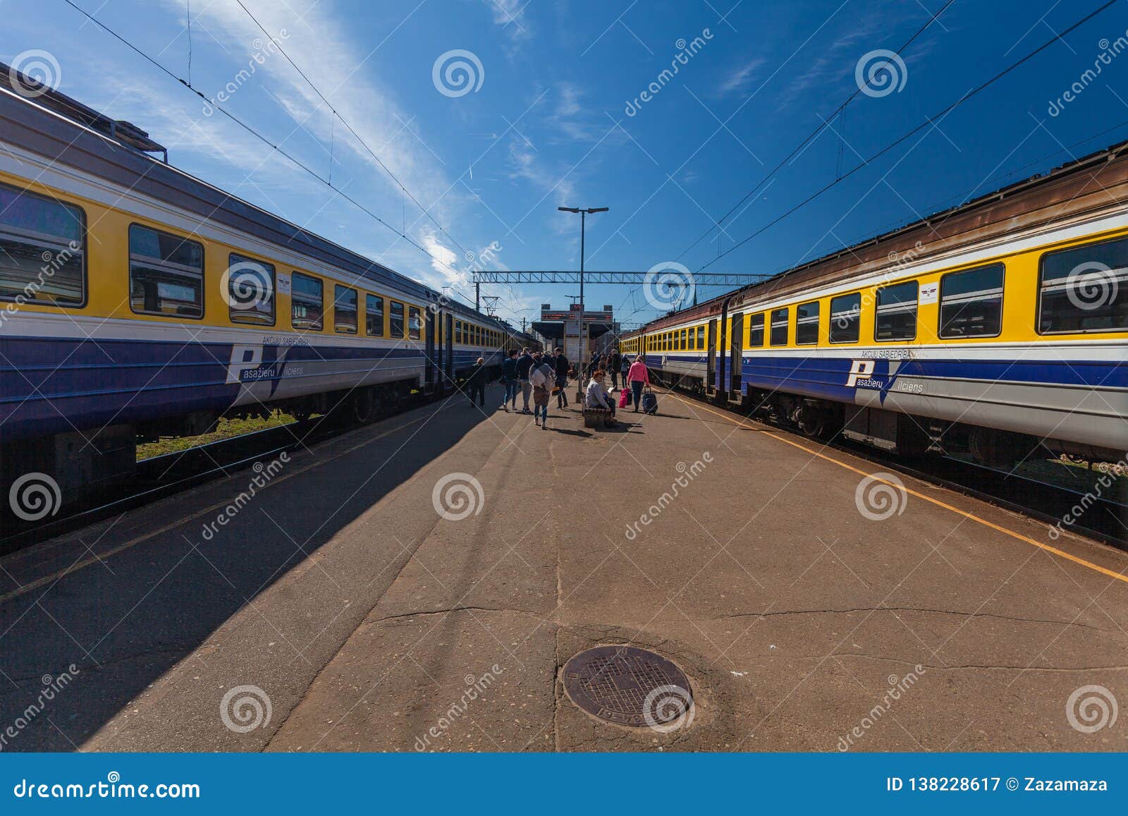 Riga, Latvia - May 7, 2017: Passengers and Trains are on the Platform ...
