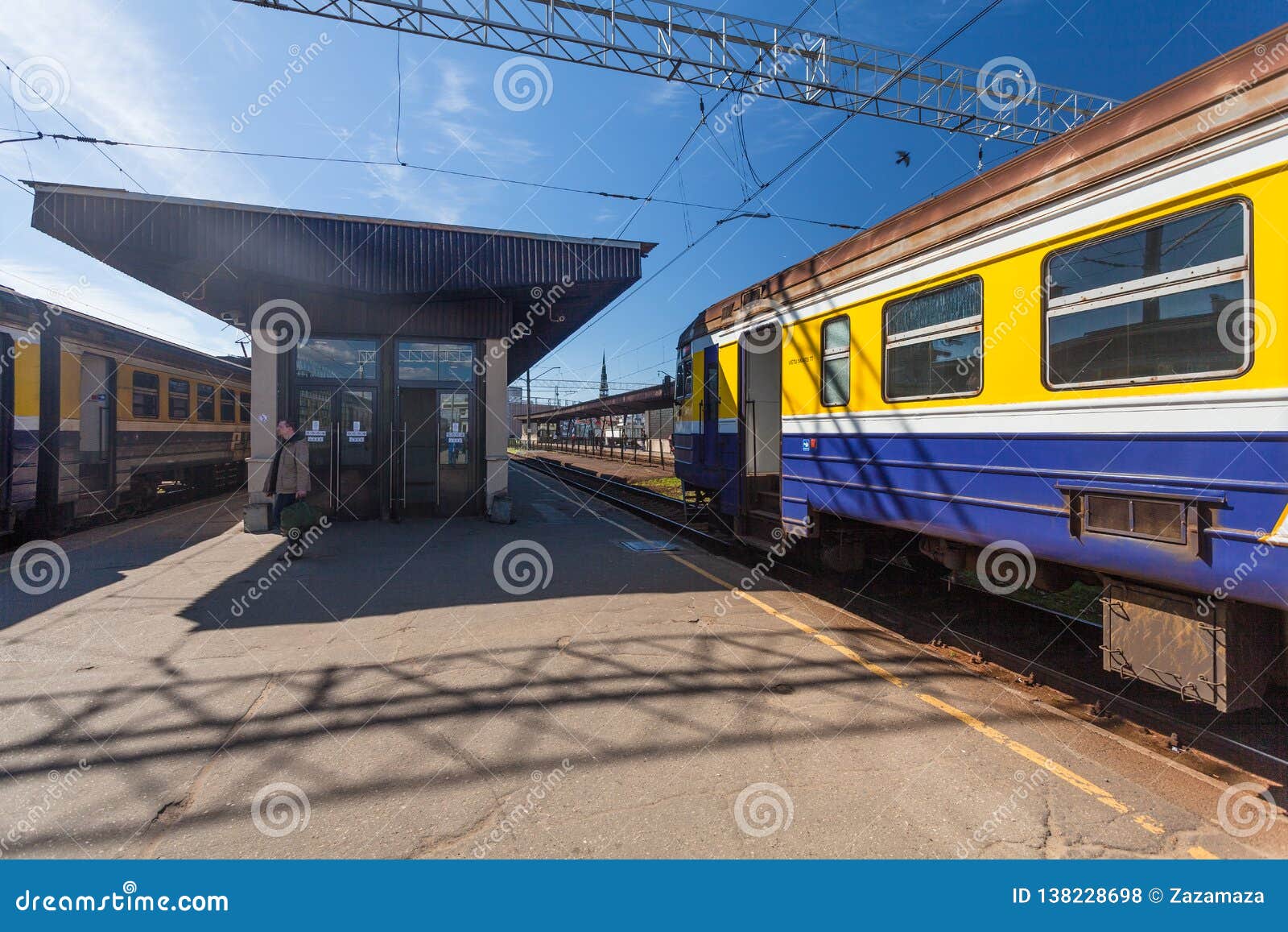 Riga, Latvia - May 7, 2017: Passengers and Trains are on the Platform ...