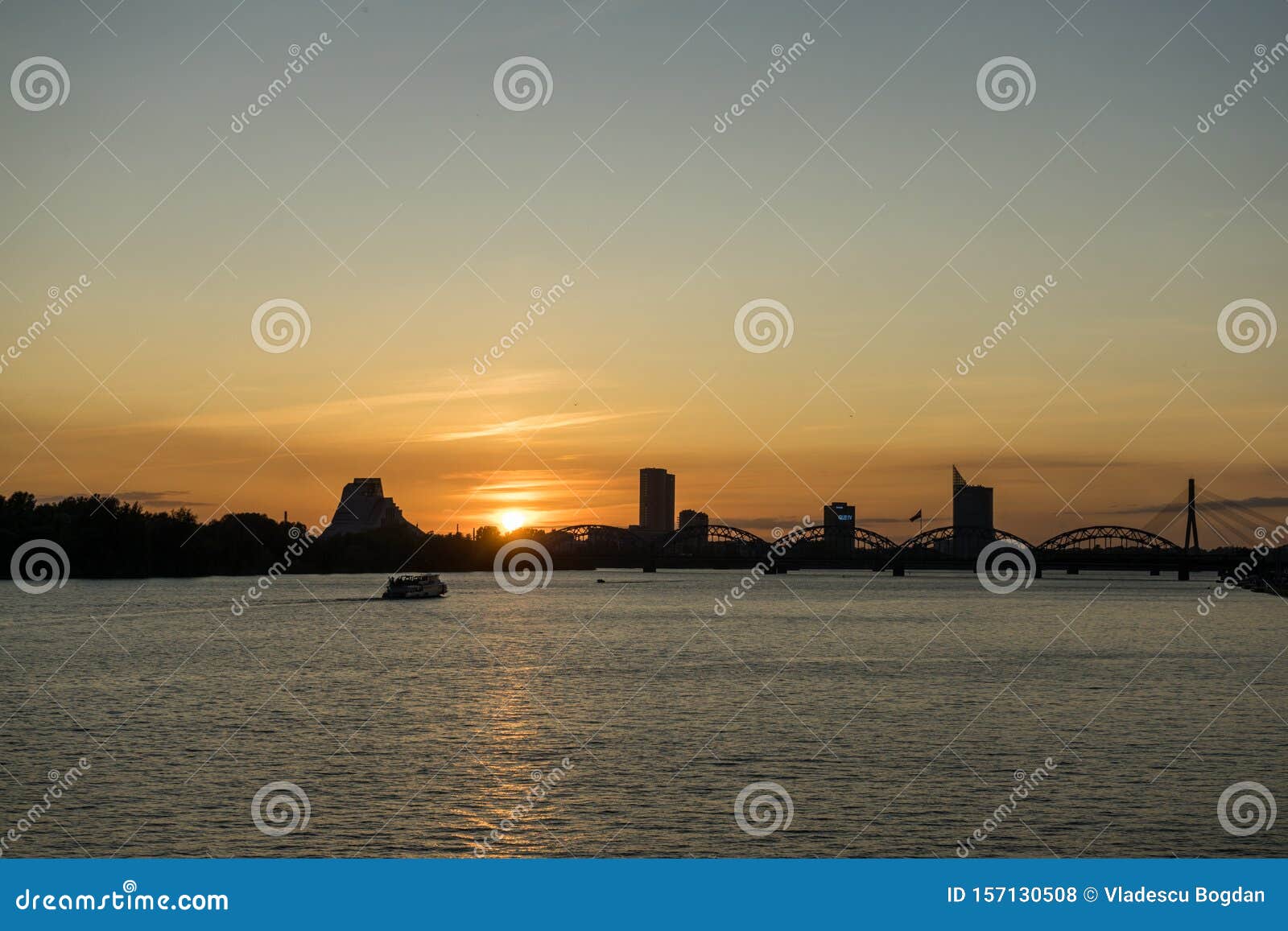 Riga at sunset, Latvia stock photo. Image of sunset - 157130508