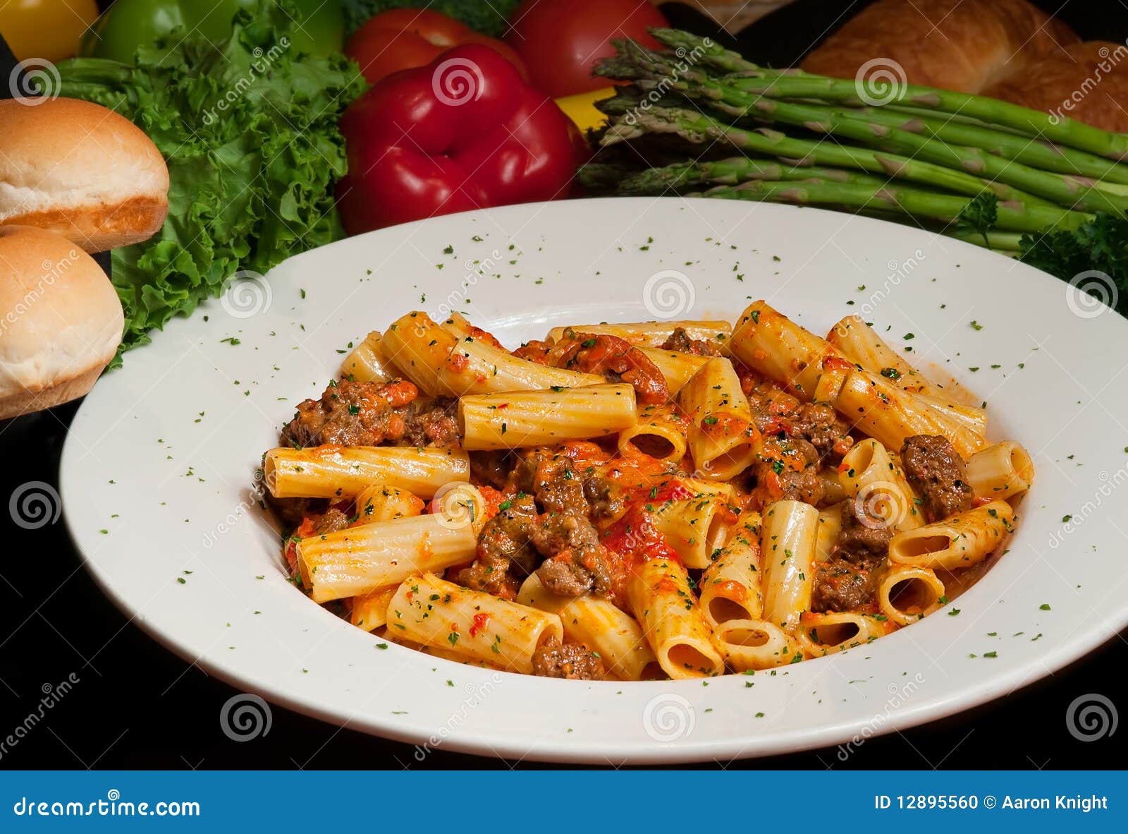 Rigatoni Pasta with Sausage Stock Photo - Image of bread, pasta: 12895560