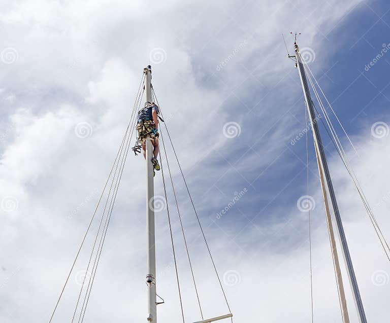 Rigger in a sailboat mast stock image. Image of rope - 102370977