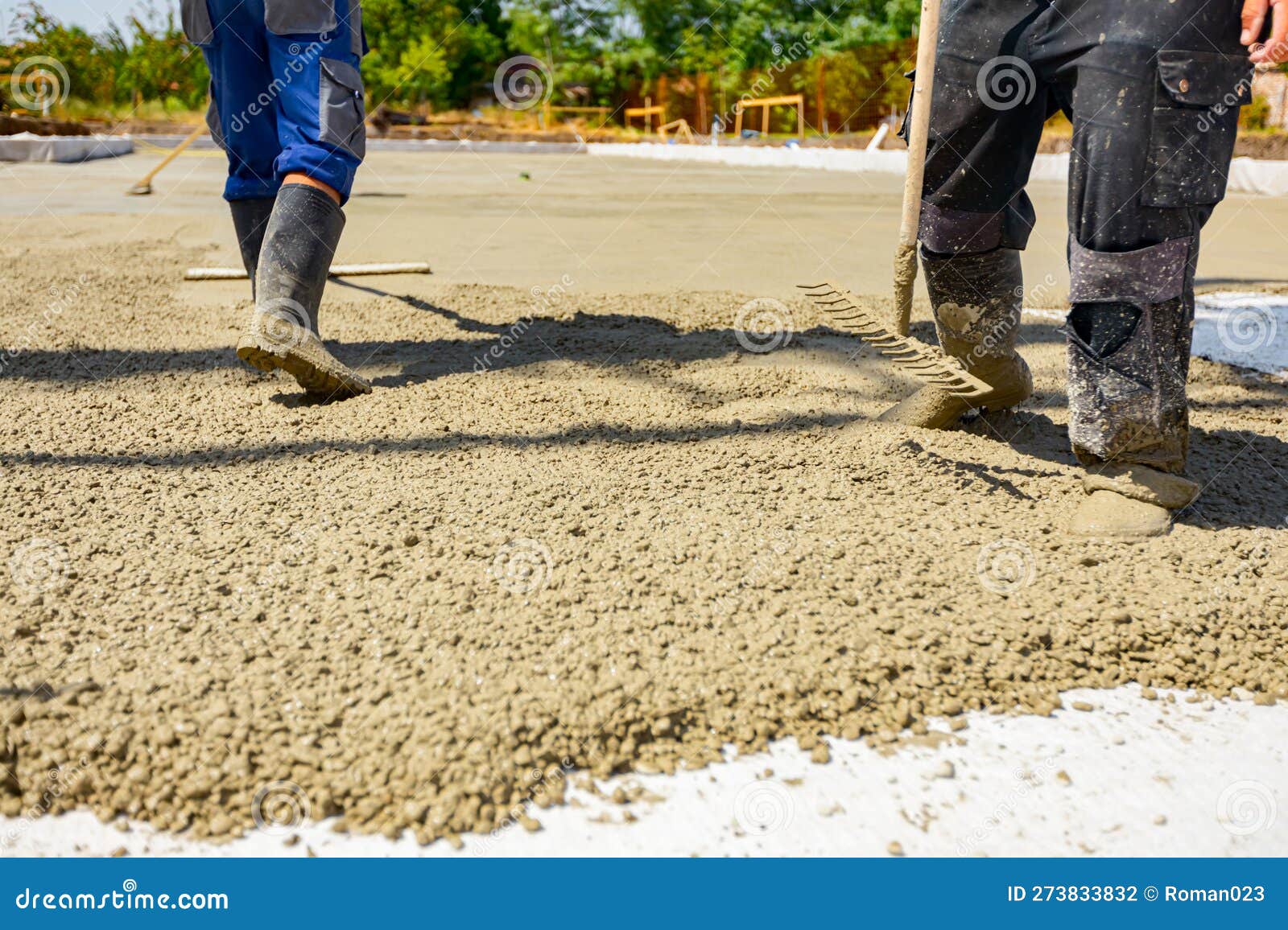 Riggers, Workers Use Rake and Handmade Wooden Tool To Level Fresh ...