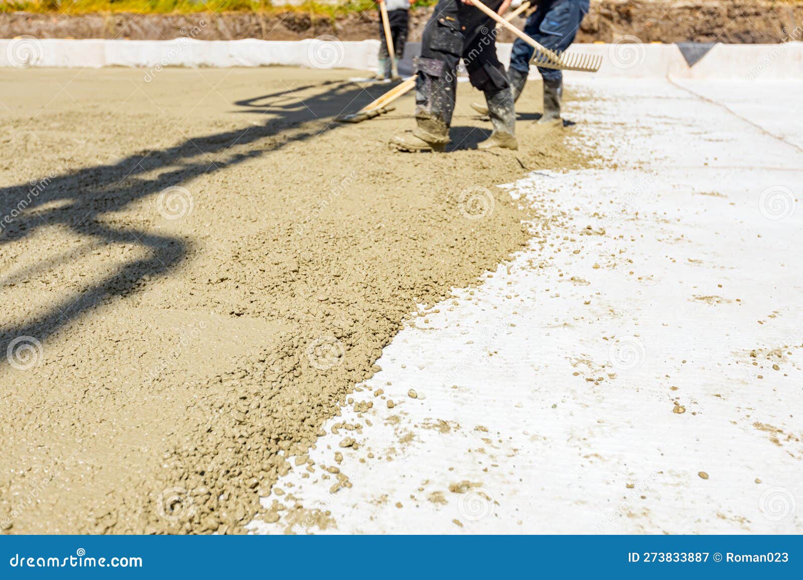 Riggers, Workers Use Rake and Handmade Wooden Tool To Level Fresh ...