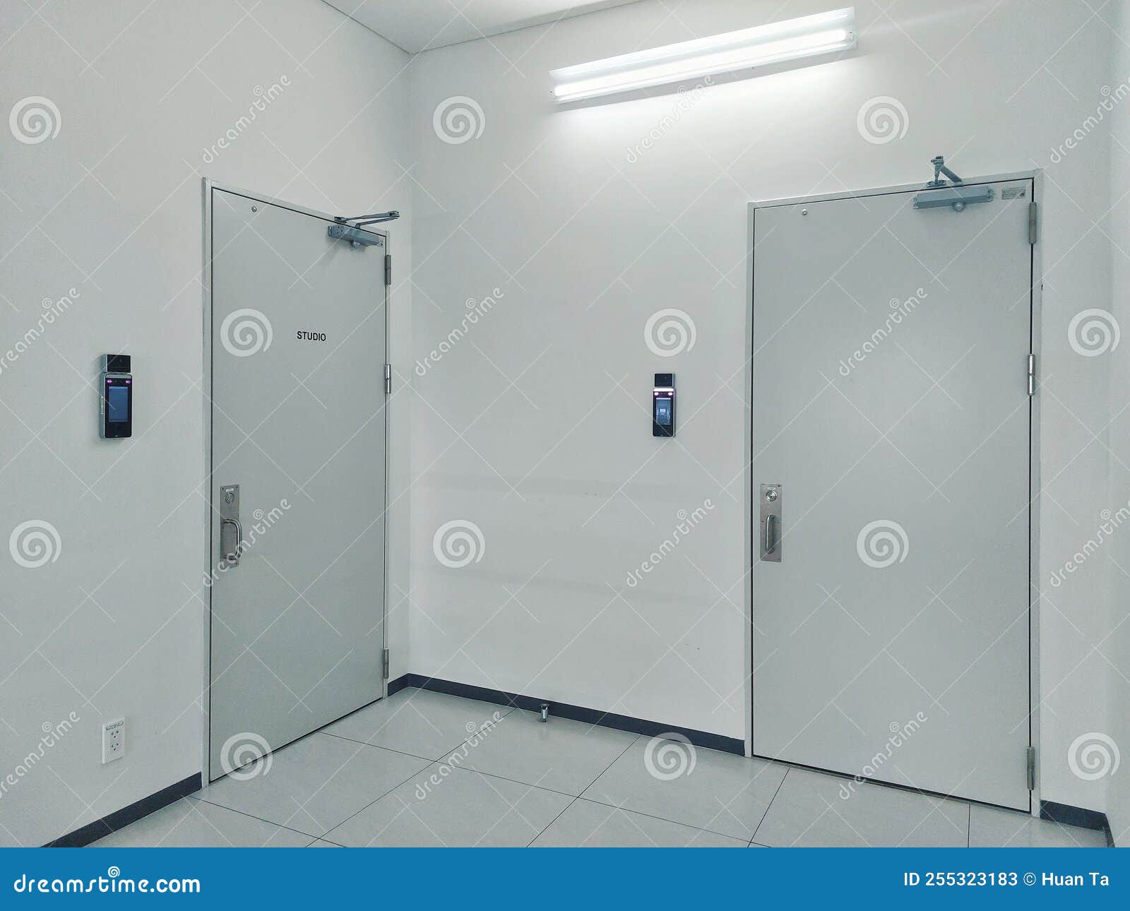 A Right Angle Wall with Doors and Facial Recognition Security Door ...