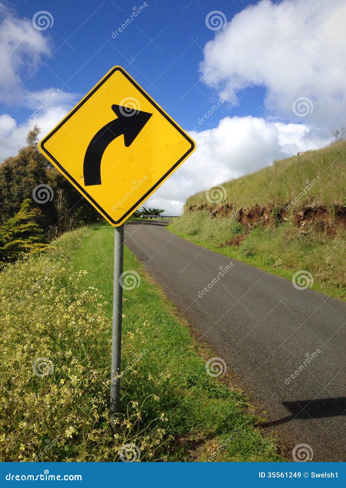 Right Bend Road Sign stock image. Image of right, clouds - 35561249