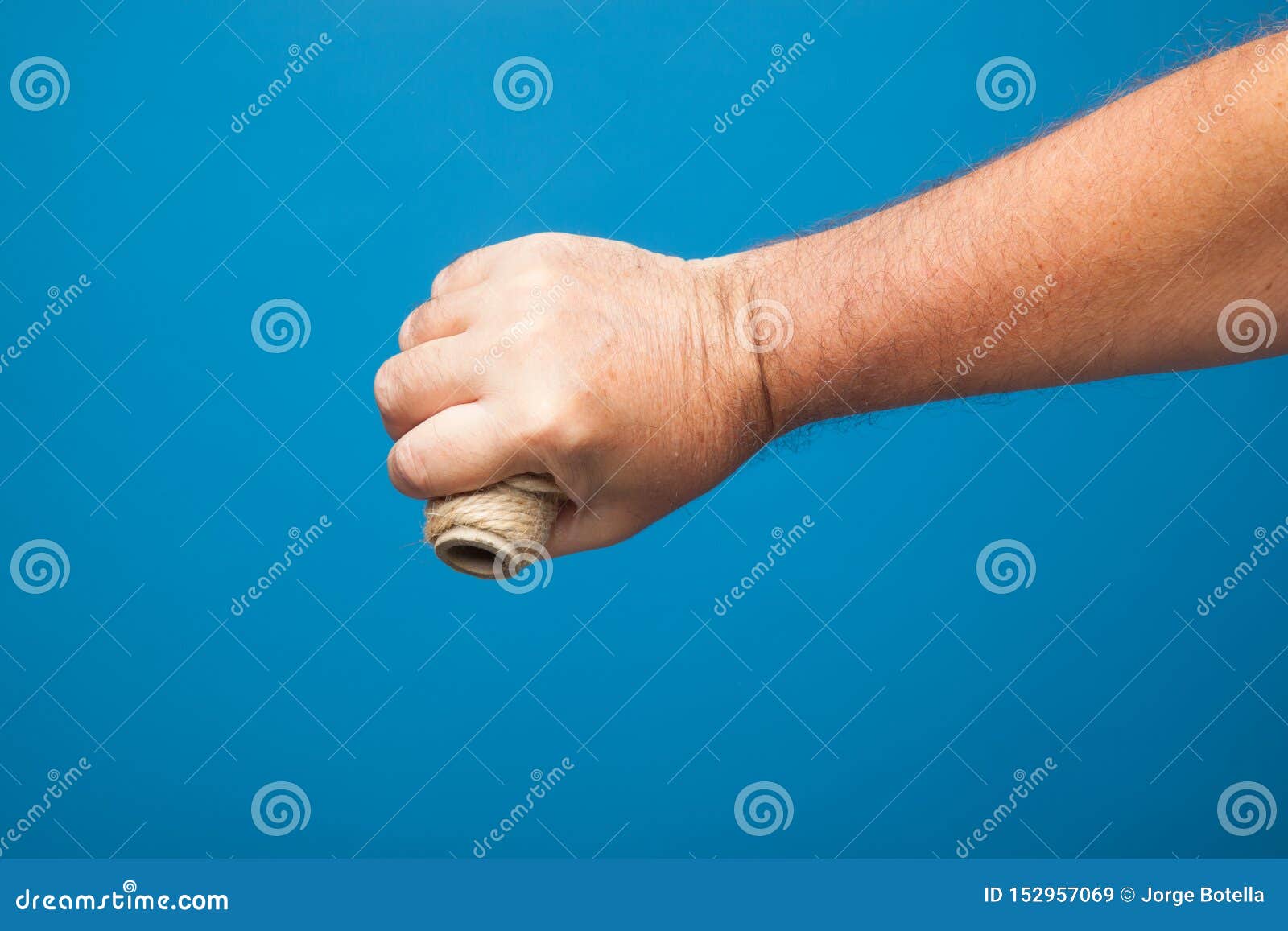 Fist of the Right Hand with Rope Stock Image - Image of rope, roll ...