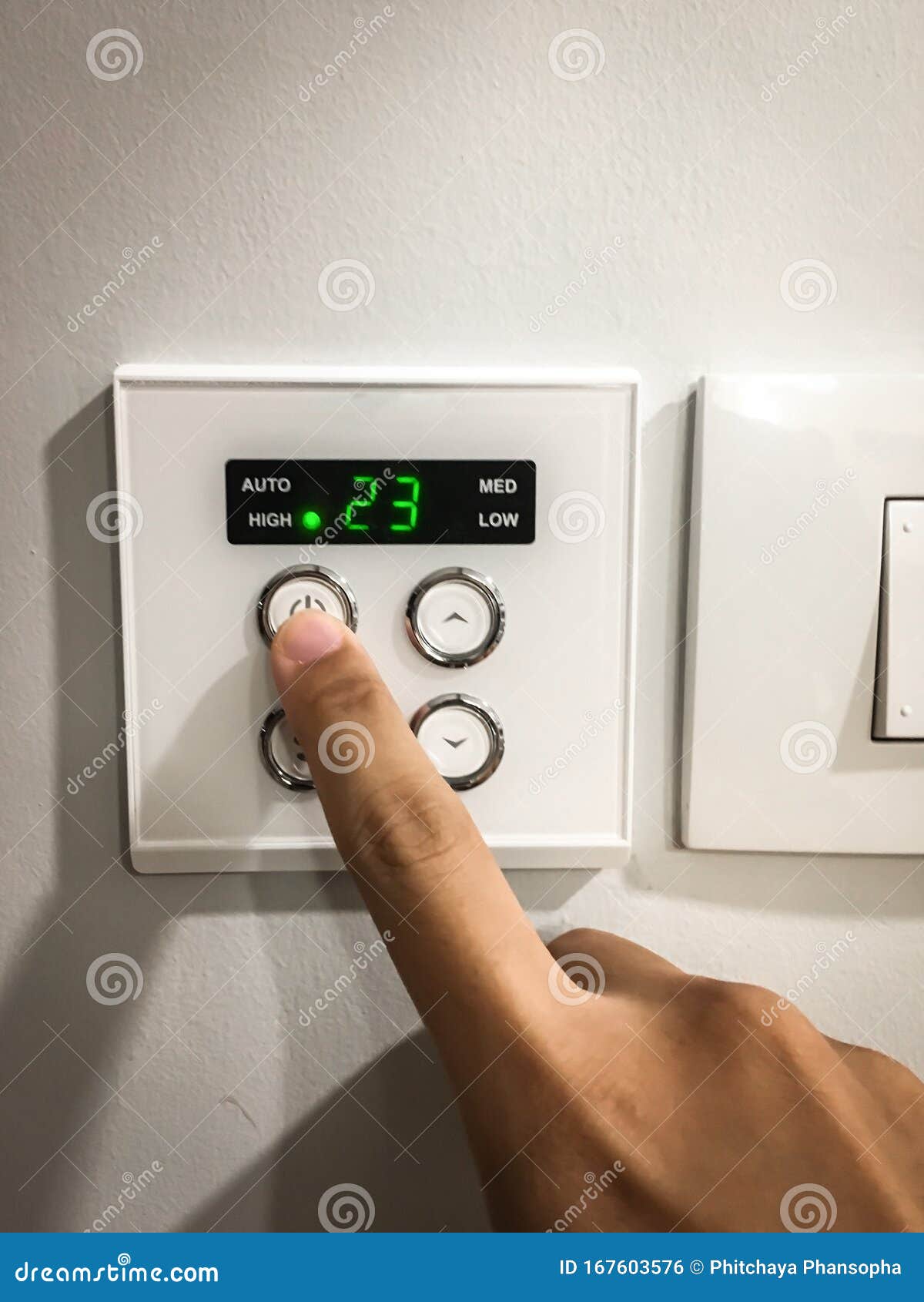 A Right Hand Switches on the Air Conditioning System Stock Photo ...