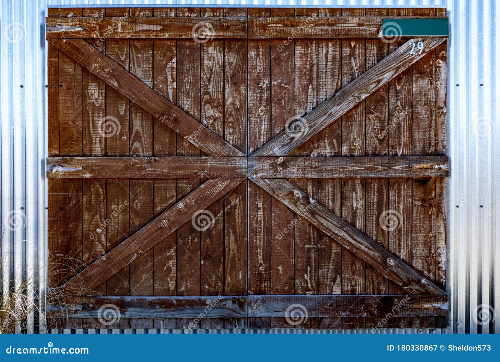 A Right Old Rustic Barn Door on a TIn Shed Stock Image - Image of ...