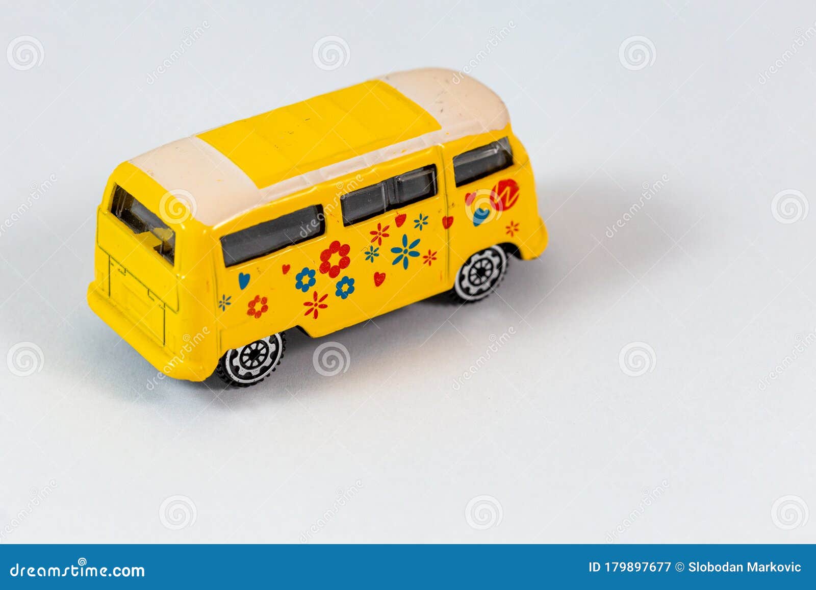 Right Side of Yellow Mini Van Stock Image - Image of flower, closeup ...